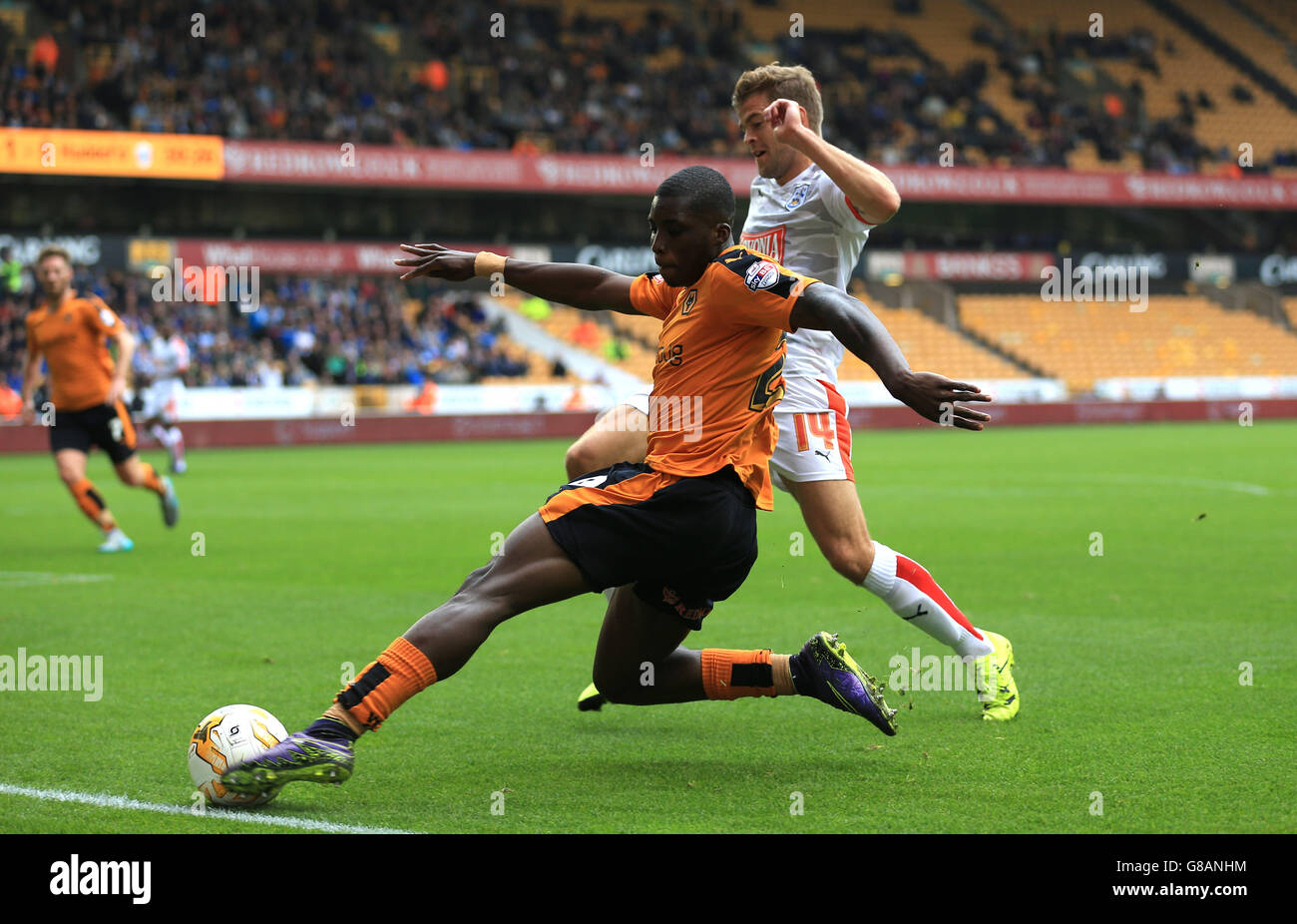 Wolverhampton Wanderers' Sheyi Ojo (front) and Huddersfield Town's ...