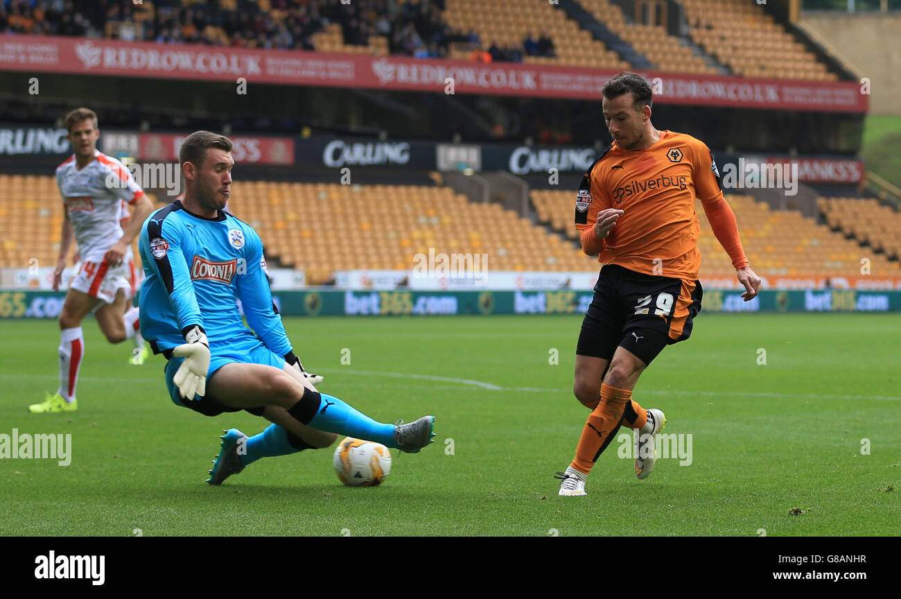 Wolverhampton Wanderers' Adam Le Fondre (right) shot is saved by ...