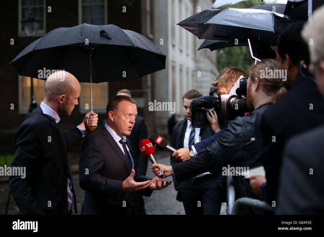 Prime Minister of Denmark Lars Lokke Rasmussen speaks with reporters ...