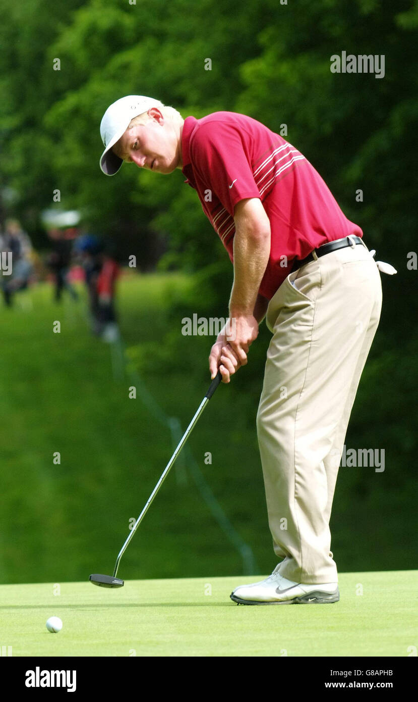 Richard finch putts on the green during his first round hi-res stock ...