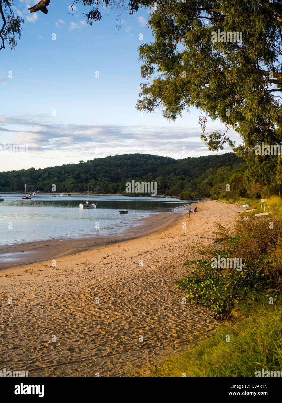 Evening falls over the waterfront at the Town of 1770, QLD, Australia ...