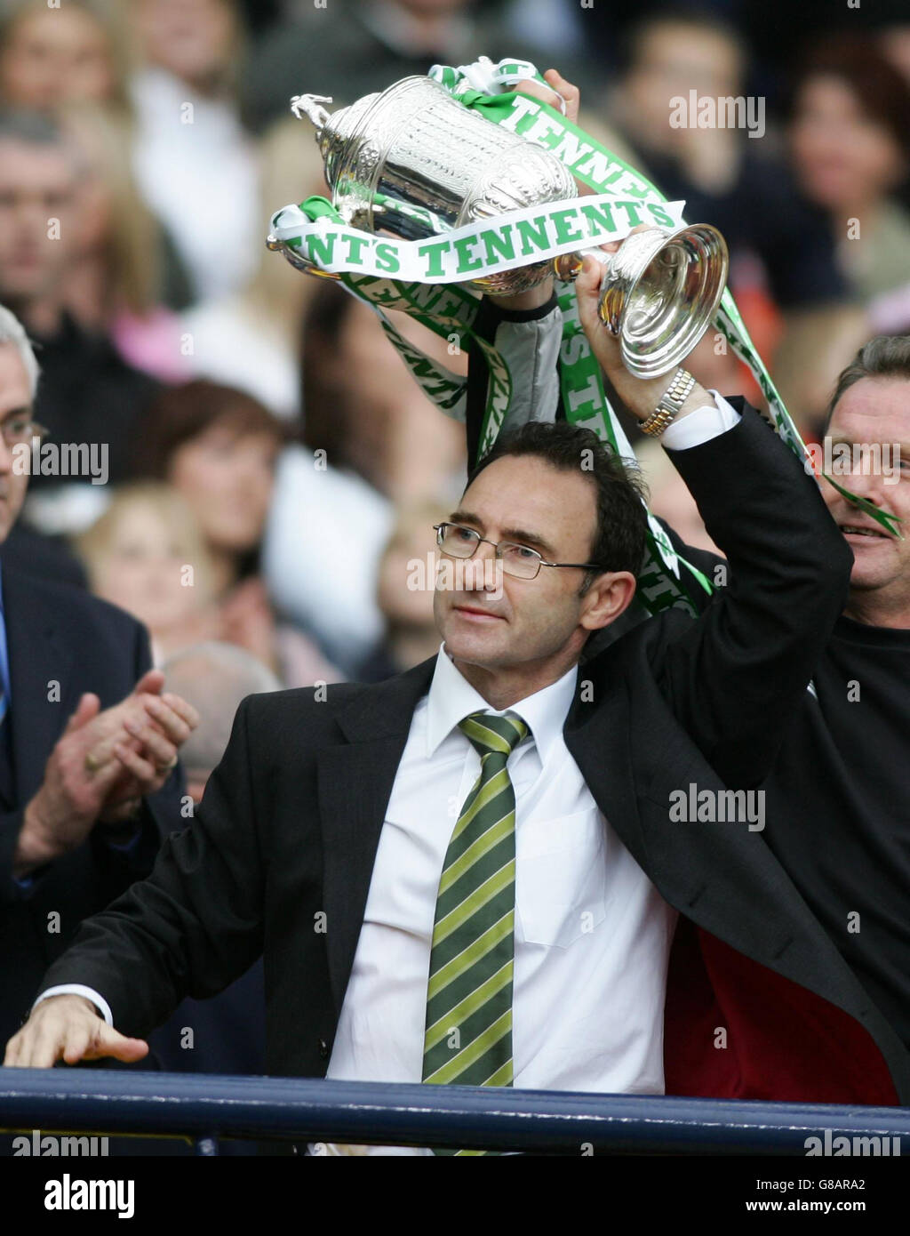 Celtic manager Martin O'Neill celebrates with the trophy after the ...