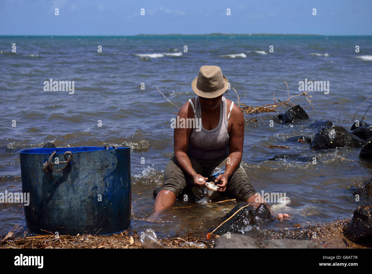 octopus fisherwoman, Anse Baleine, Rodrigues Stock Photo - Alamy