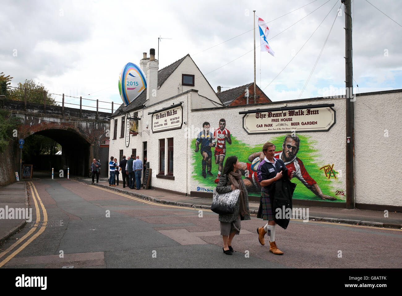 Scotland and Japan fans walk past a rugby themed pub, The Dean's Walk ...