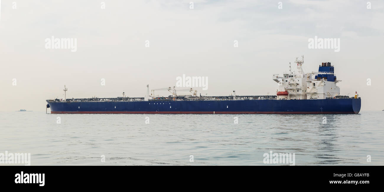 Blue oil tanker at anchor - calm weather Stock Photo - Alamy