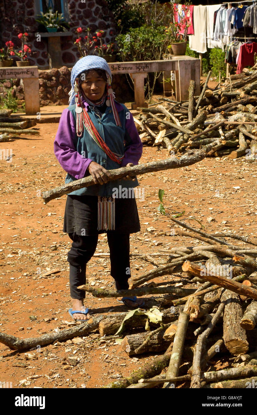 Woman of the Akha tribe in traditional dress, in a hill village near ...