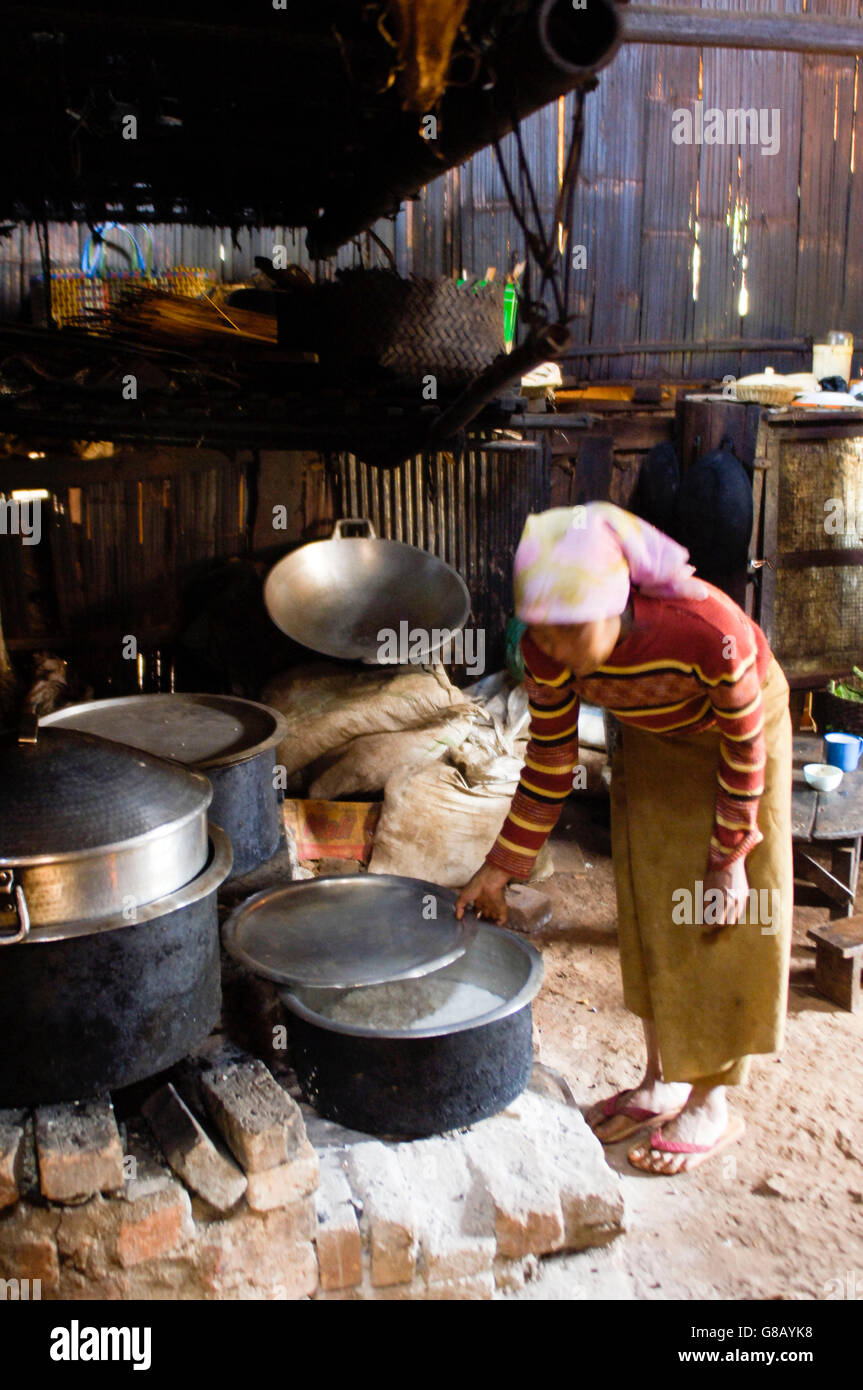 Woman of the Akha tribe in traditional dress, in a hill village near ...