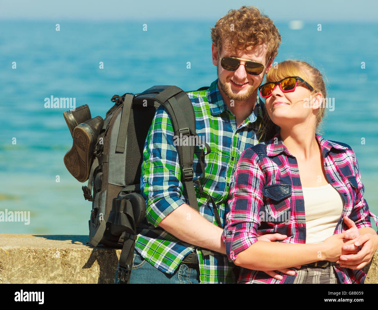 Adventure, summer, tourism active lifestyle. Young couple backpacker ...