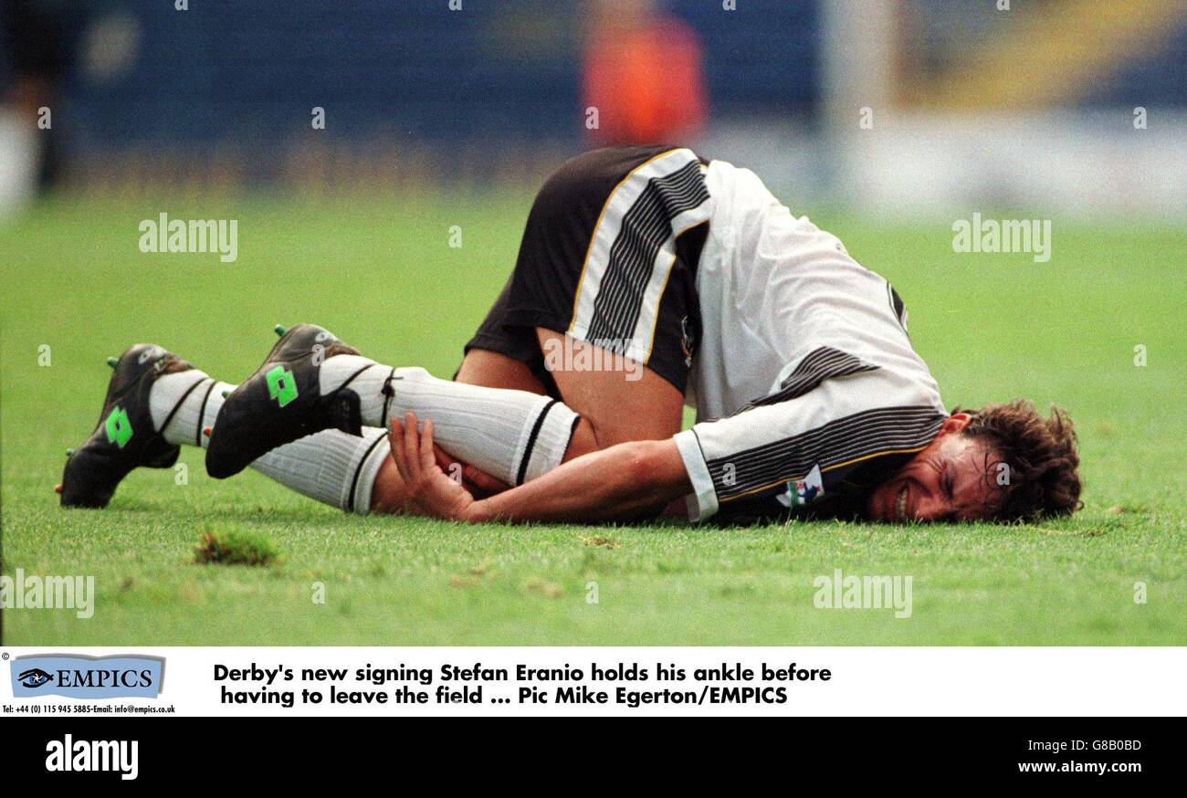 Derby's new signing Stefan Eranio holds his ankle before having to ...