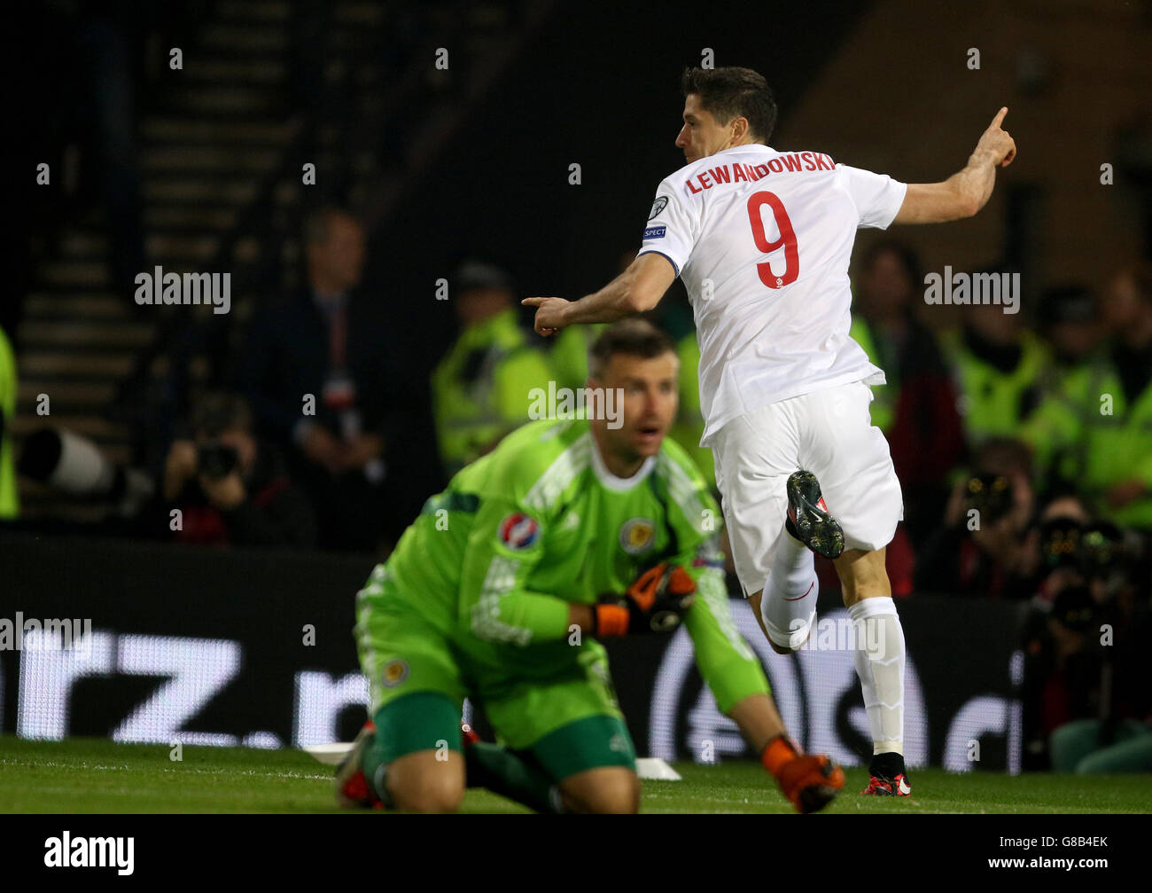 Poland's Robert Lewandowski celebrates scoring their first goal of the ...
