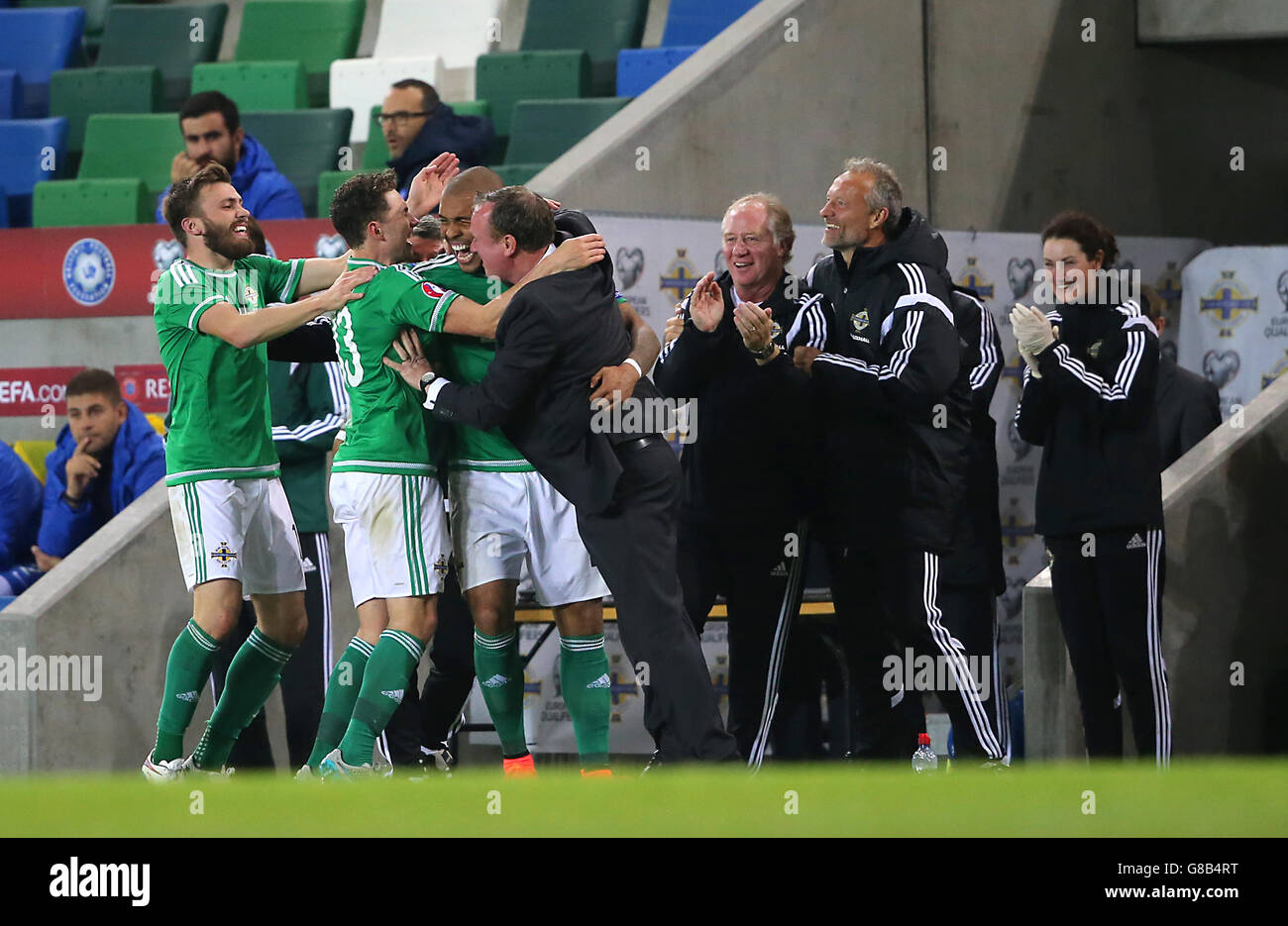 Northern Ireland's Josh Magennis (centre, left) celebrates scoring his ...