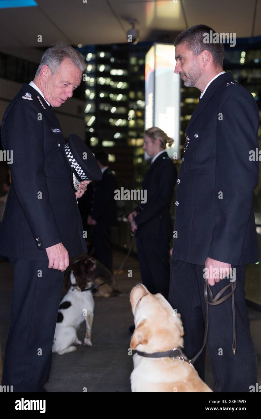 Metropolitan Police commissioner Sir Bernard Hogan-Howe (left) arrives ...