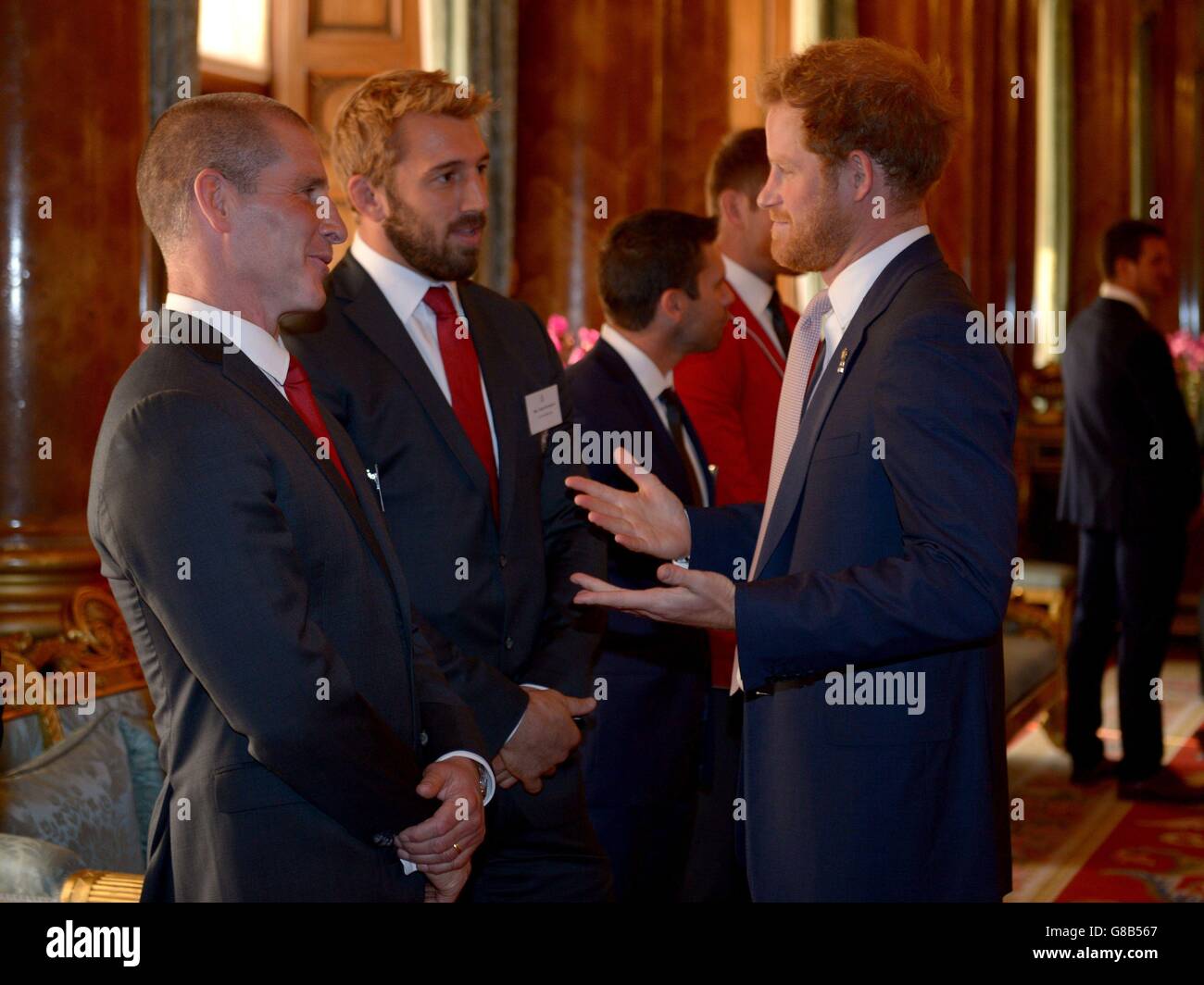 Prince Harry speaks with England Rugby Union head coach Stuart ...