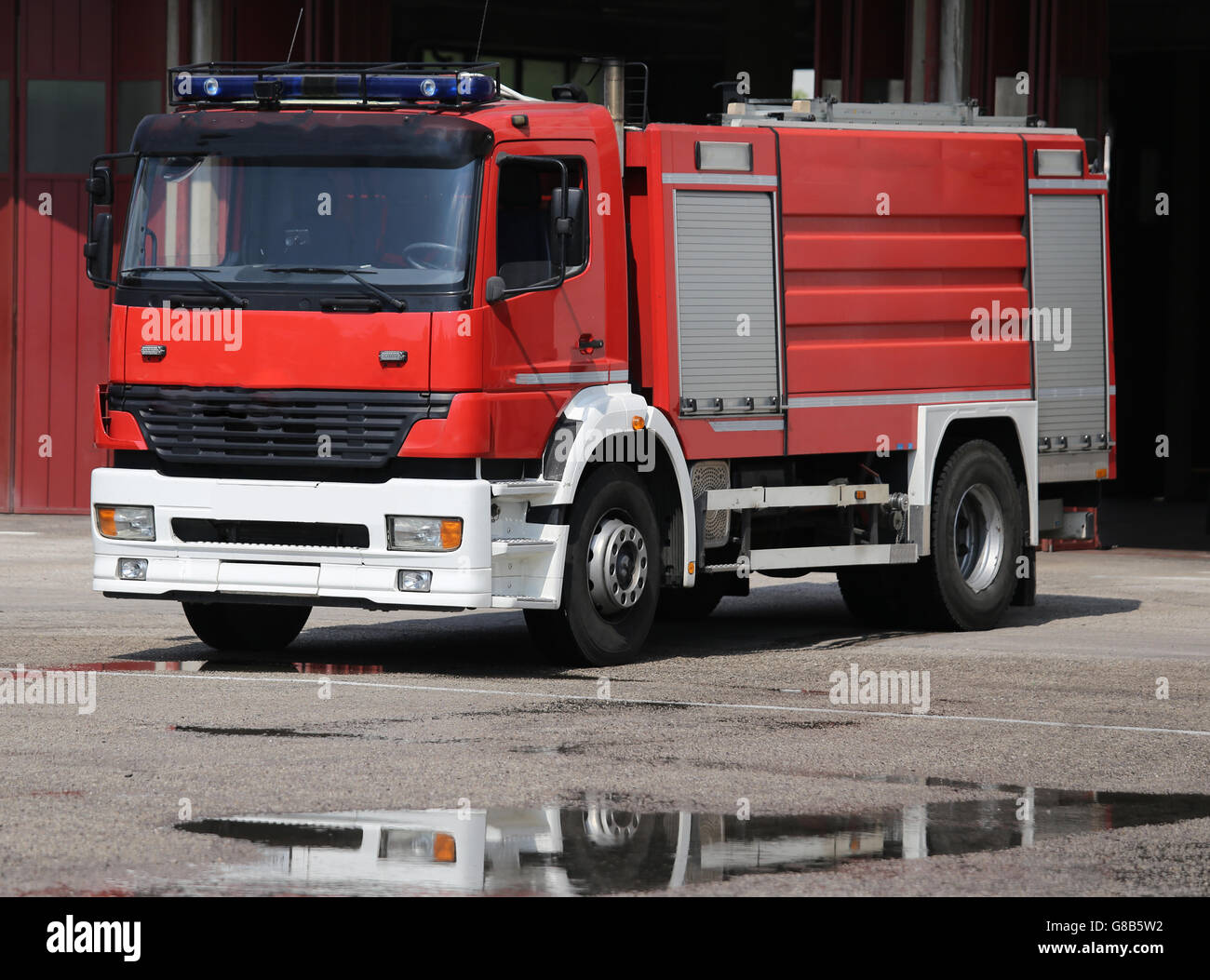 one fire engine truck during a fire drill in the fire brigade station ...