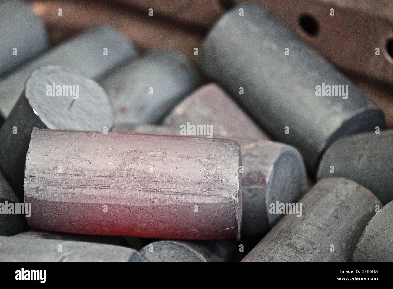 metal round billets for further processing Stock Photo - Alamy