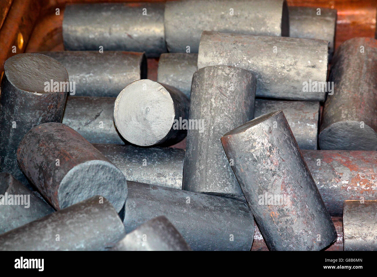 metal round billets for further processing Stock Photo - Alamy