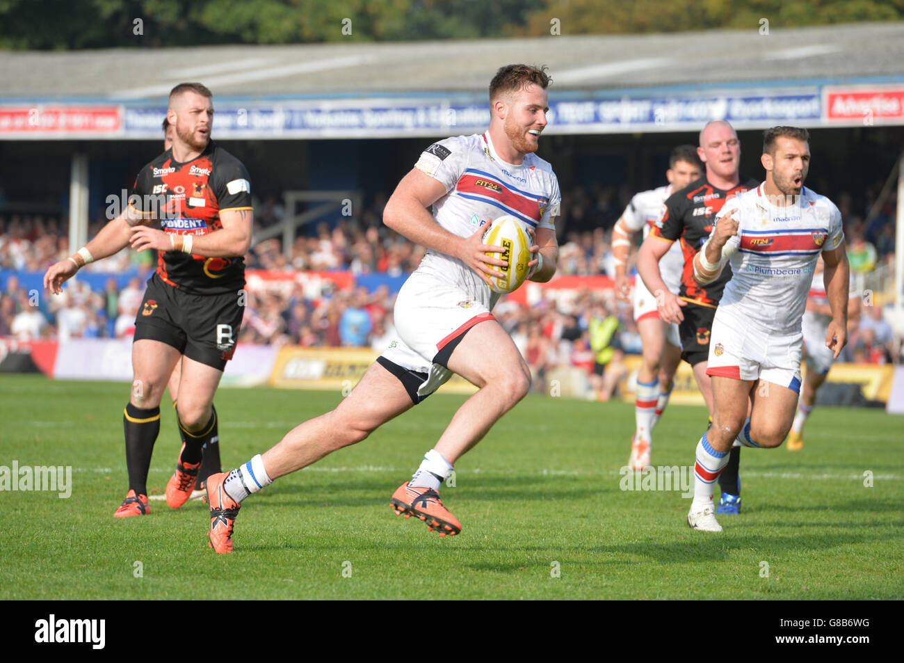 Wakefield Trinity Wildcats Anthony Mullally runs clear to score a try ...