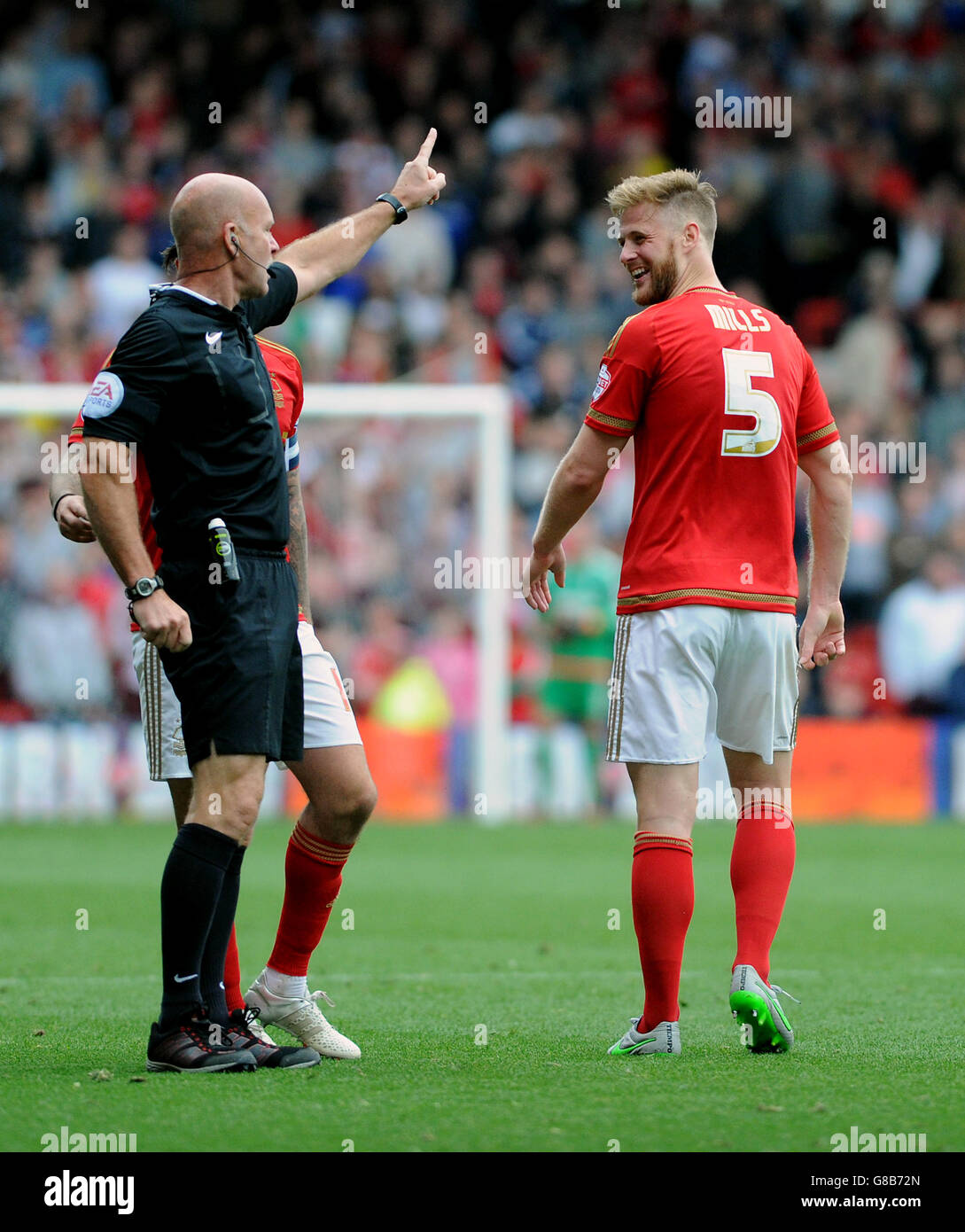 Nottingham Forest's Matt Mills is shown the red card by referee Nigel ...