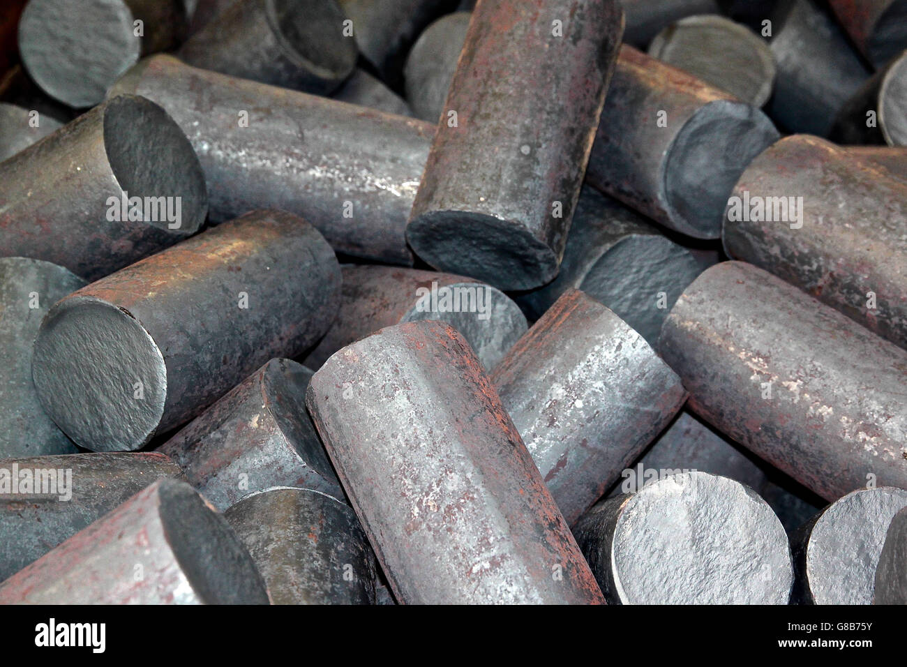 metal round billets for further processing Stock Photo - Alamy