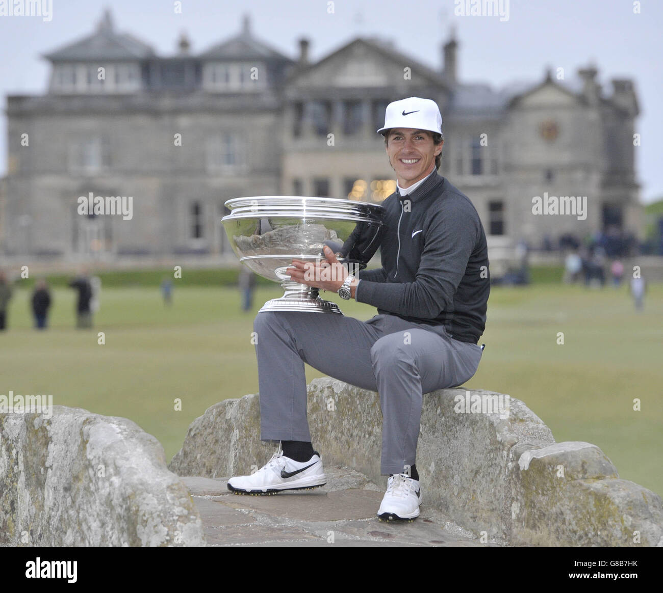 Thorbjorn Olesen holds the Dunhill Cup on the Swilken Bridge during day ...