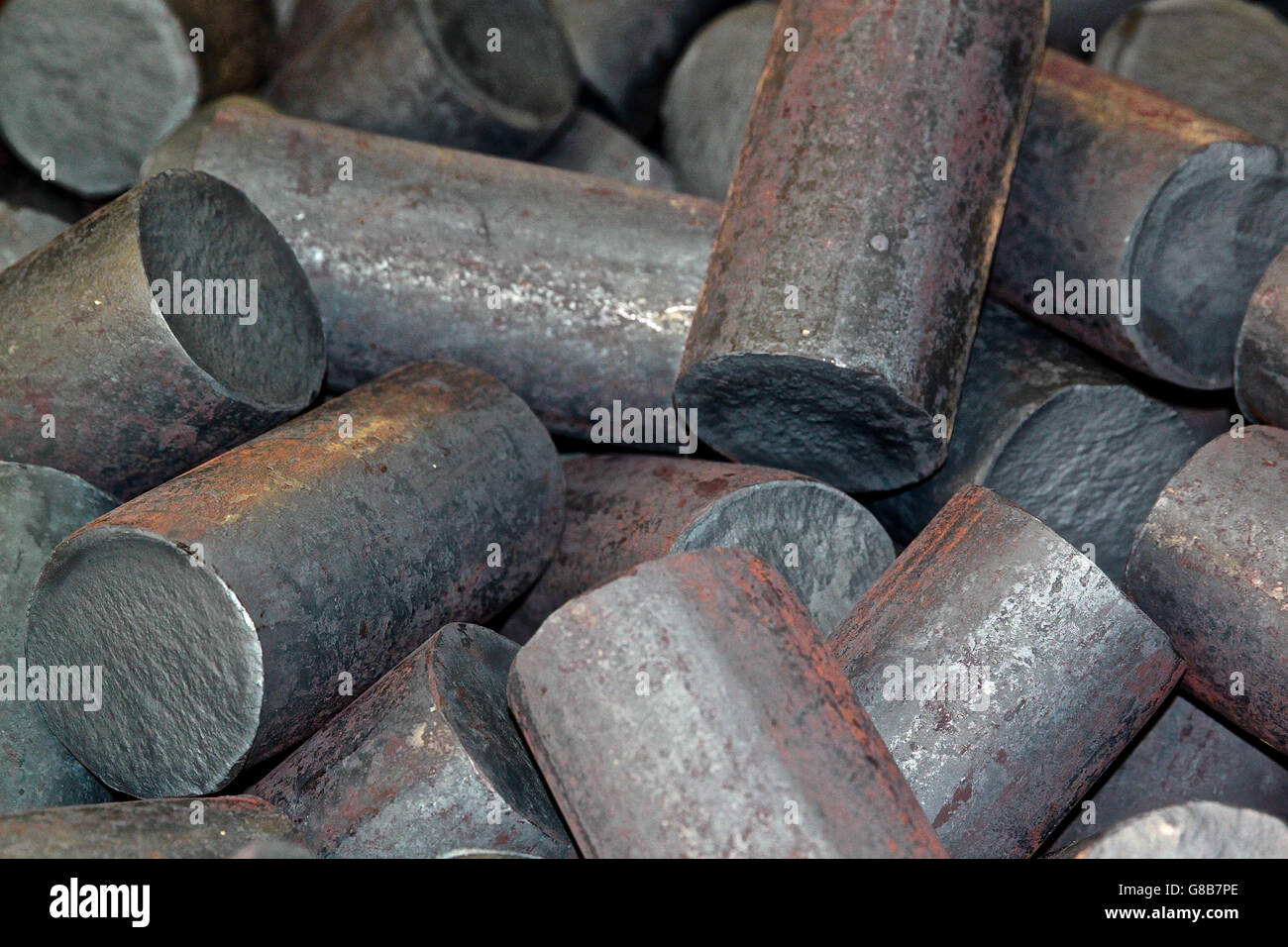 metal round billets for further processing Stock Photo - Alamy