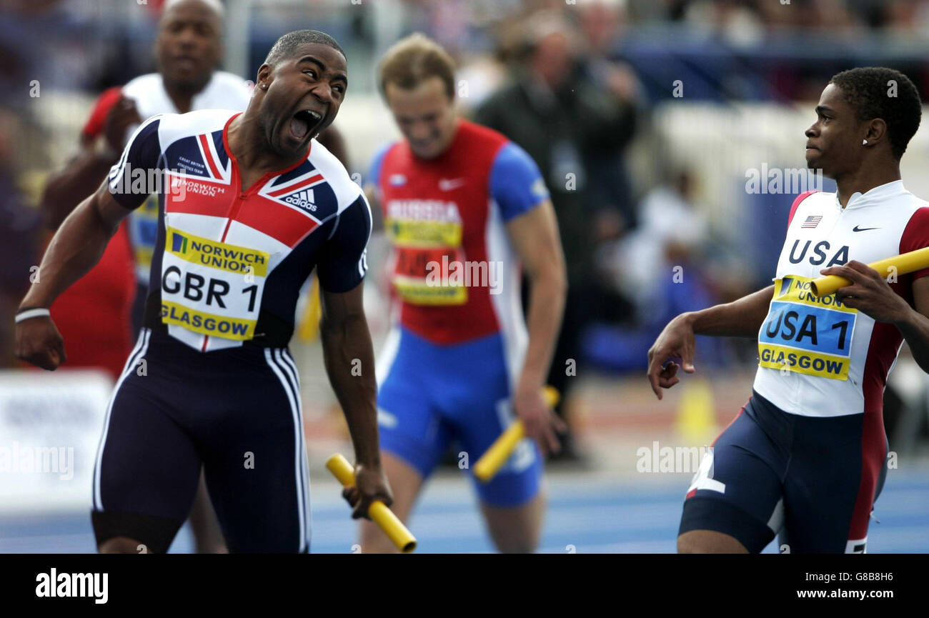 Great Britain's Mark Lewis-Francis (L) celebrates winning the 4x100 ...