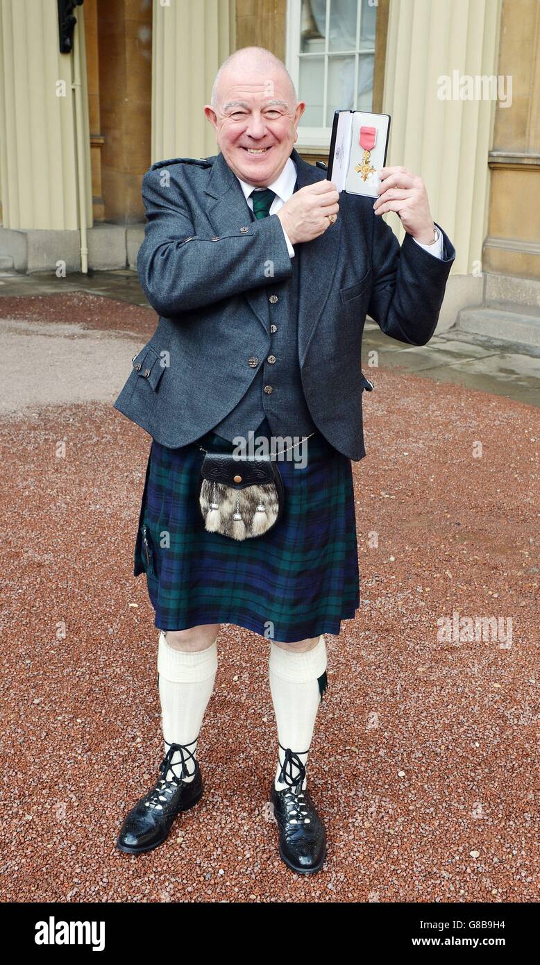Archibald Graham holds his OBE ( Order of the British Empire) award ...