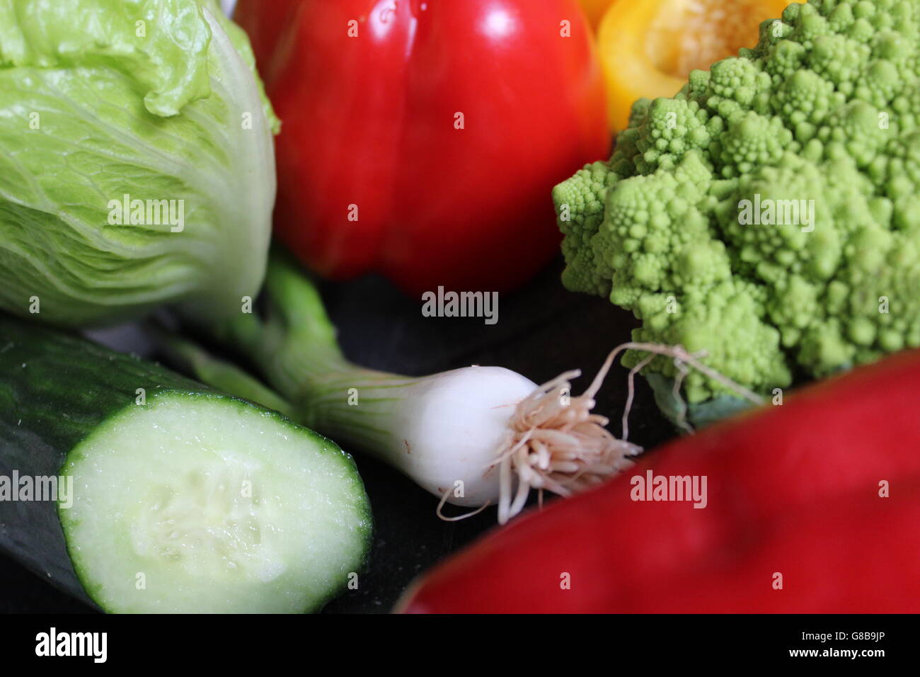 Vibrant, brightly colored, fresh vegetables, including peppers ...