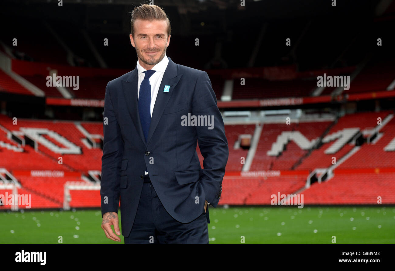 David Beckham stands on the Old Trafford pitch to launch the upcoming ...