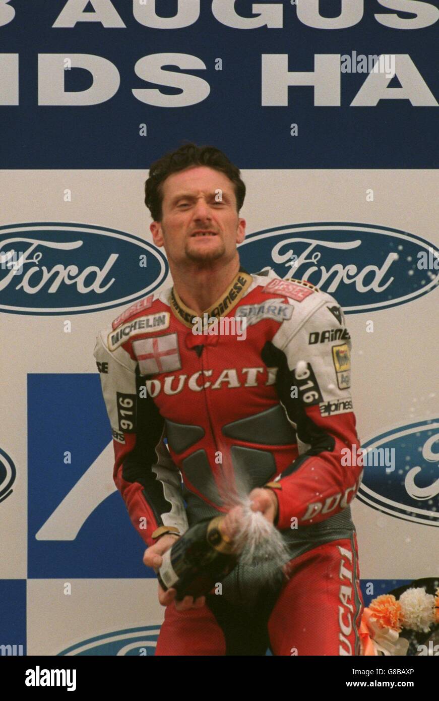Carl fogarty celebrates his victory in the second race hi-res stock ...