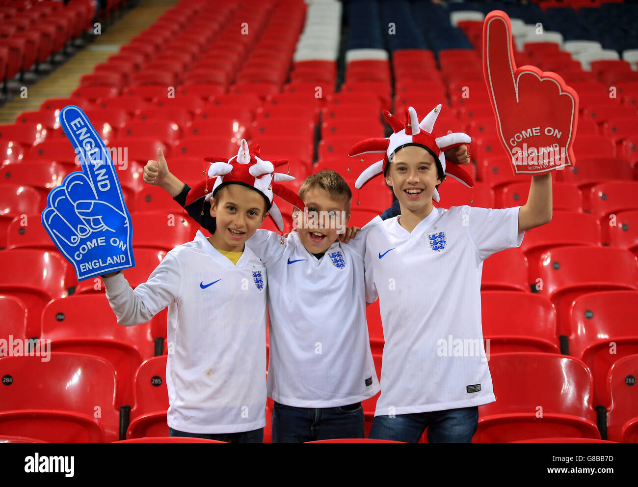 Young fans show support in stands hi-res stock photography and images ...
