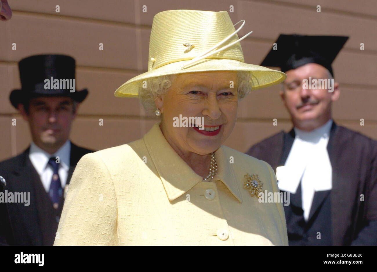 Britain's Queen Elizabeth II tours the new Faculty of English at ...