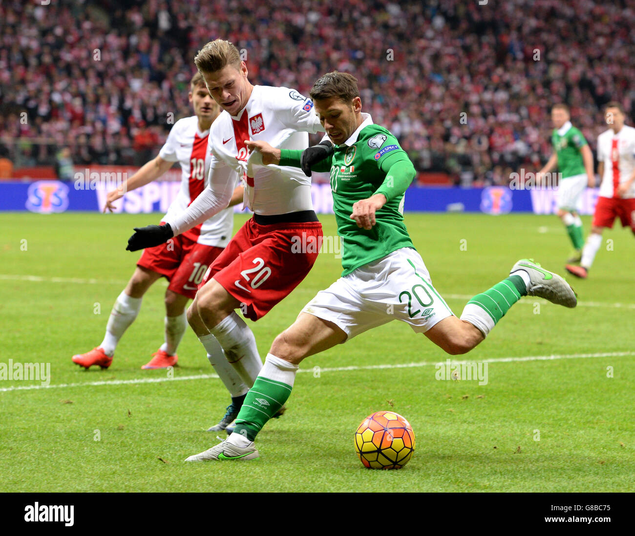 Republic of Ireland's Wes Hoolahan battles for the ball Poland's Lukasz ...