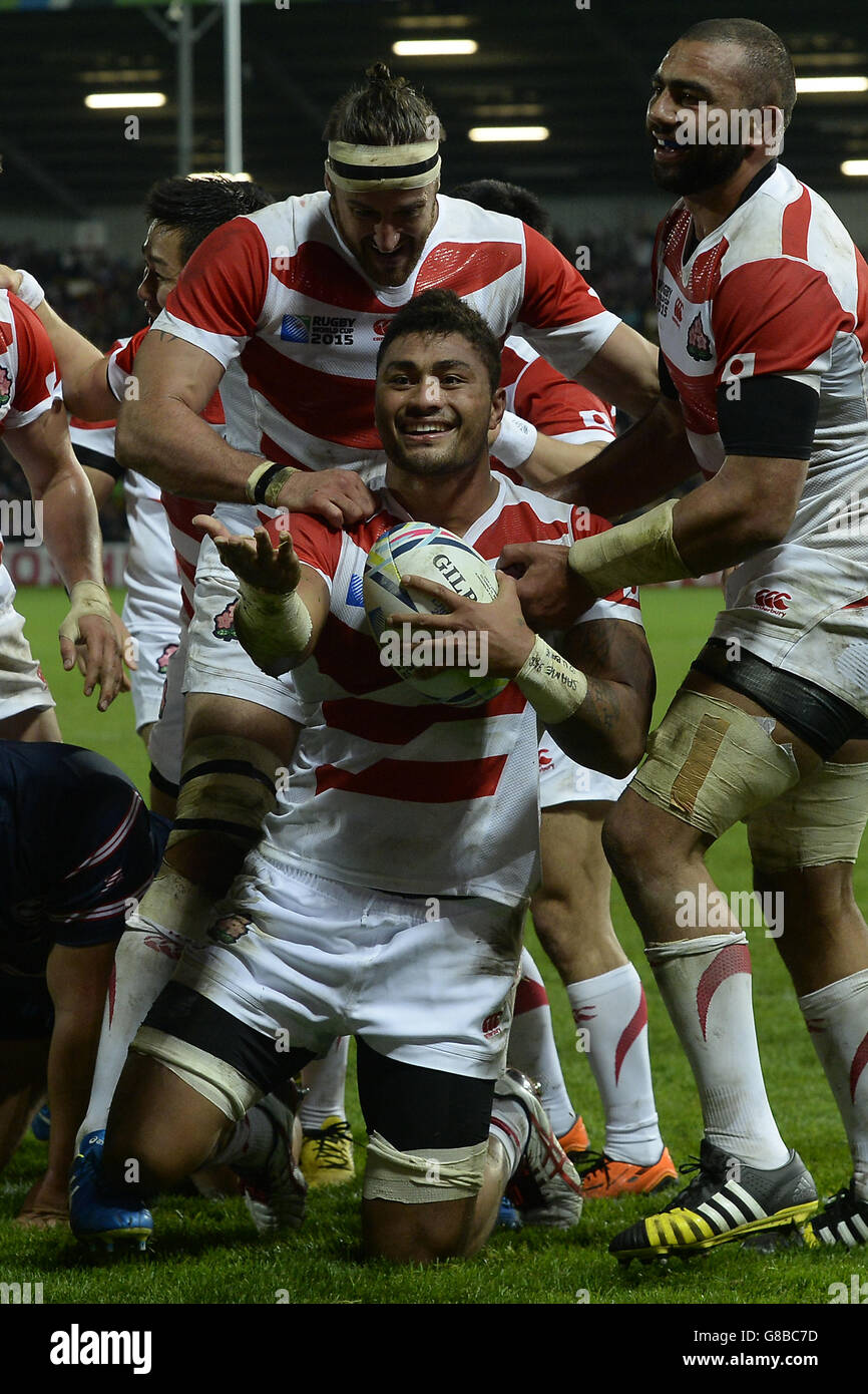 Japan's Amanaki Mafi celebrates after scoring a try during the Rugby ...