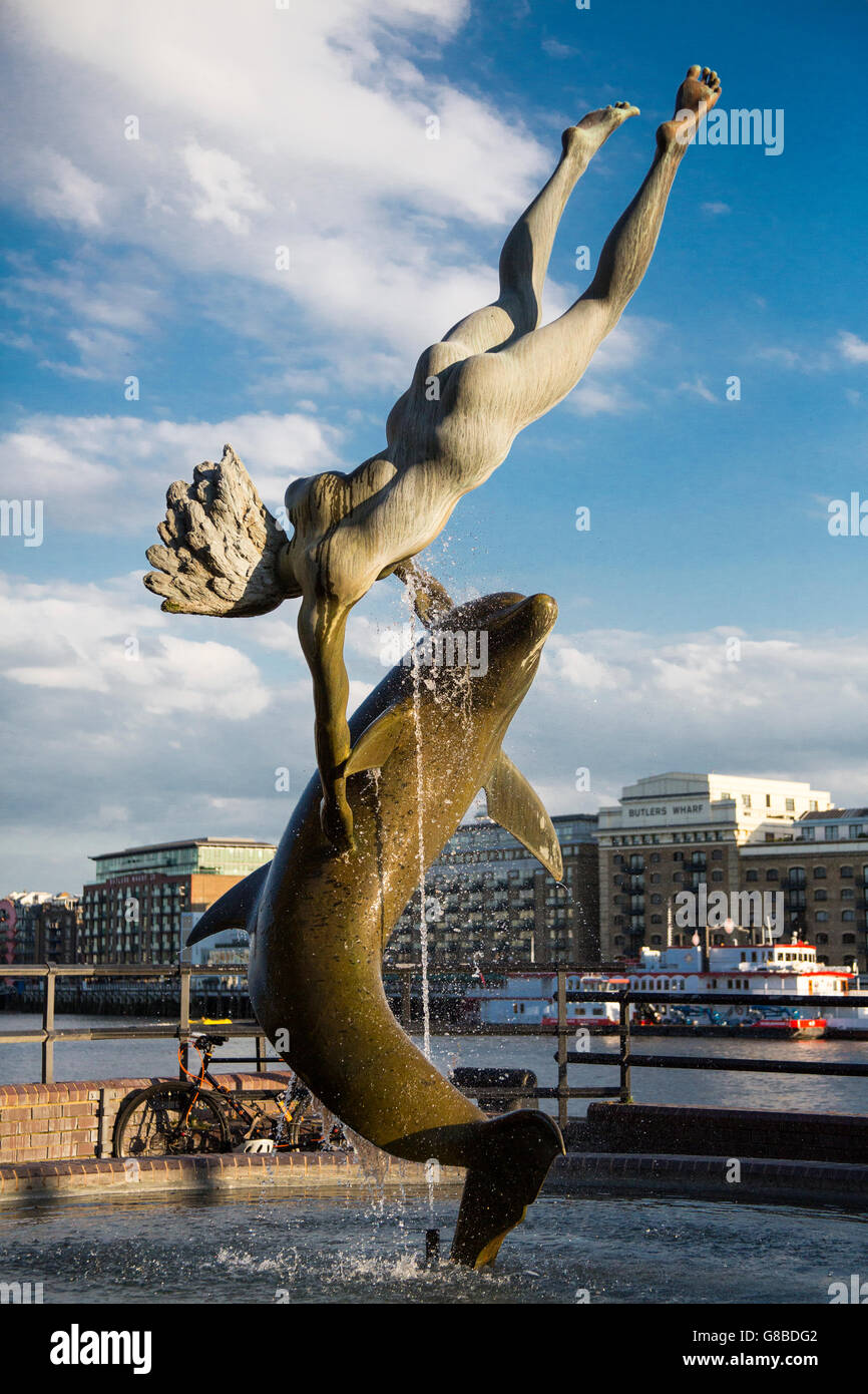 Girl With a Dolphin Statue in London Stock Photo - Alamy