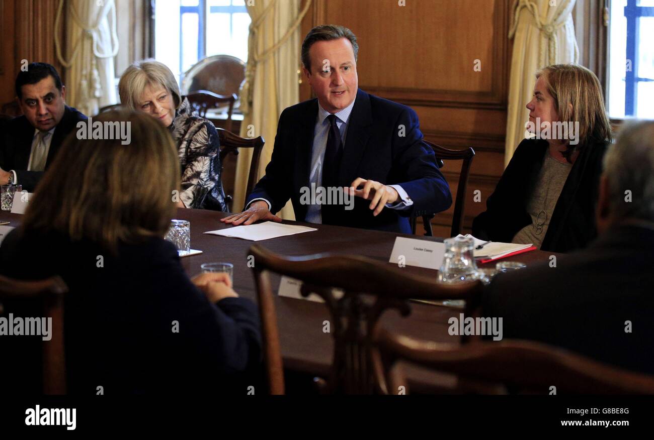 Prime Minister David Cameron (second right), alongside Lord Ahmad (left ...