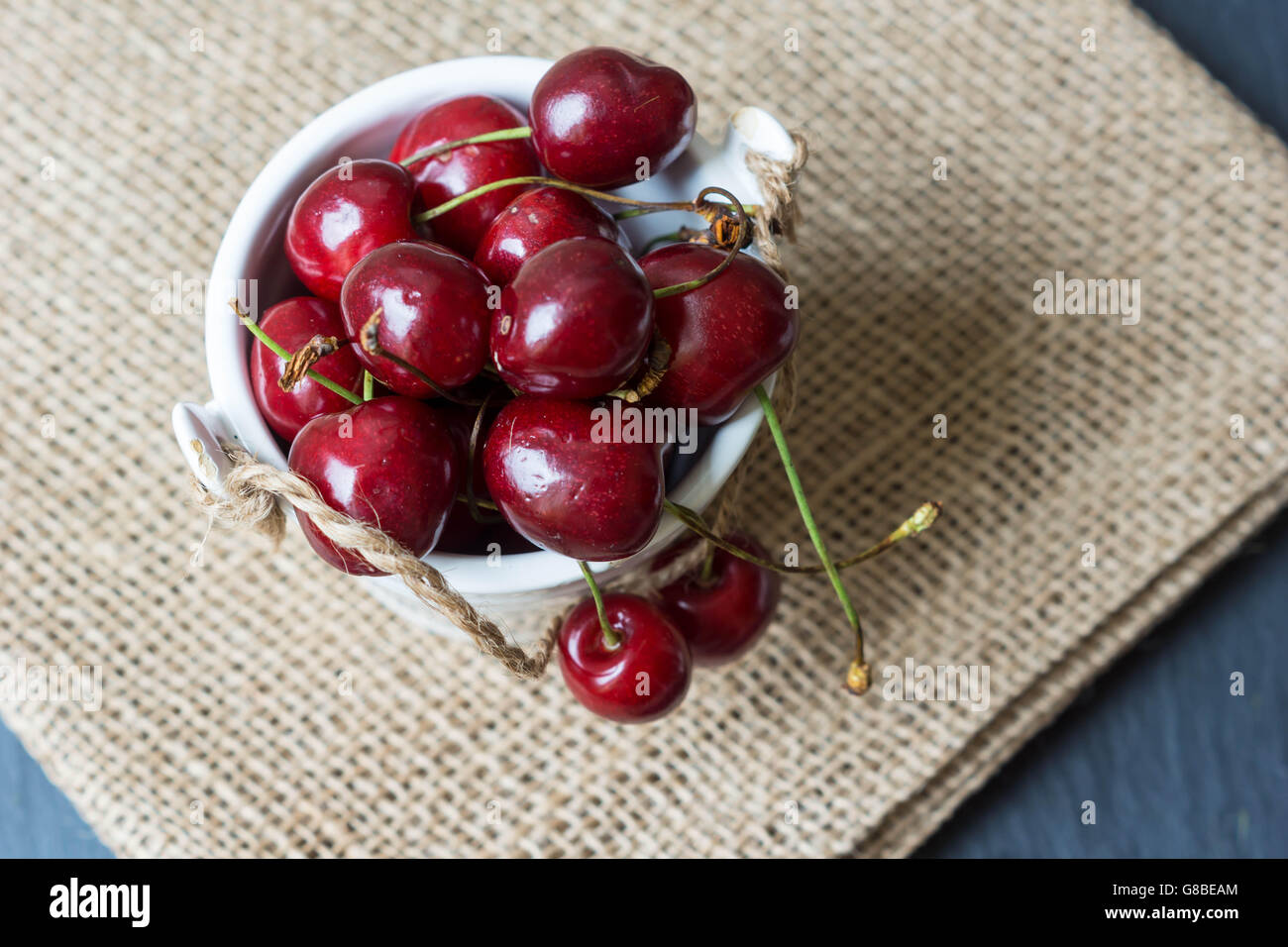 Fresh sour cherries in a ceramic pot Stock Photo - Alamy
