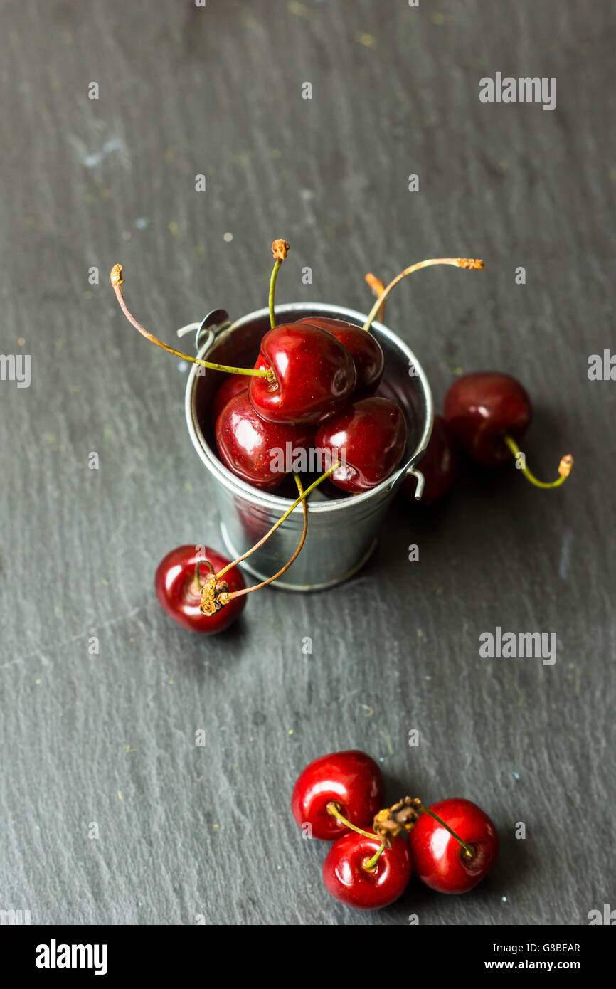 Fresh sour cherries in a metal pot Stock Photo - Alamy
