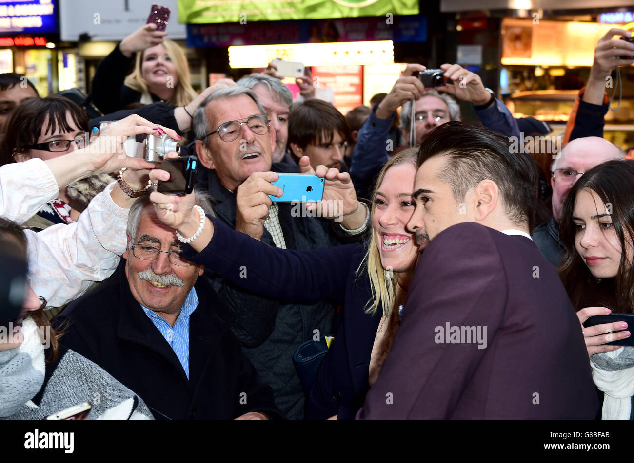Colin Farrell poses for selfies with fans whilst attending the official ...