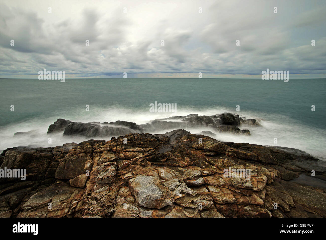 beautiful coastline with ocean waves crashing rocks Stock Photo - Alamy