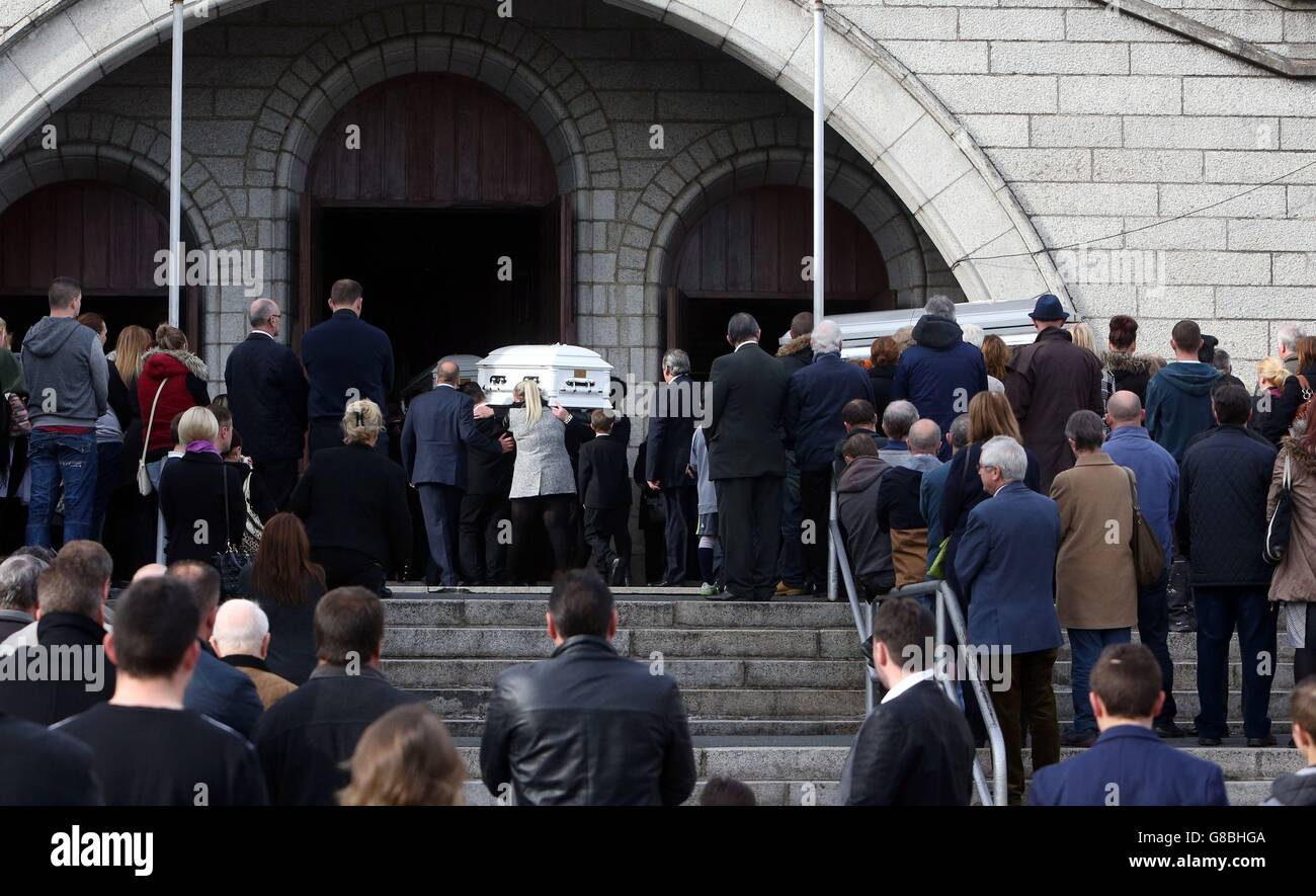 The coffins arrive at the Church of the Holy Redeemer in Bray, Co ...