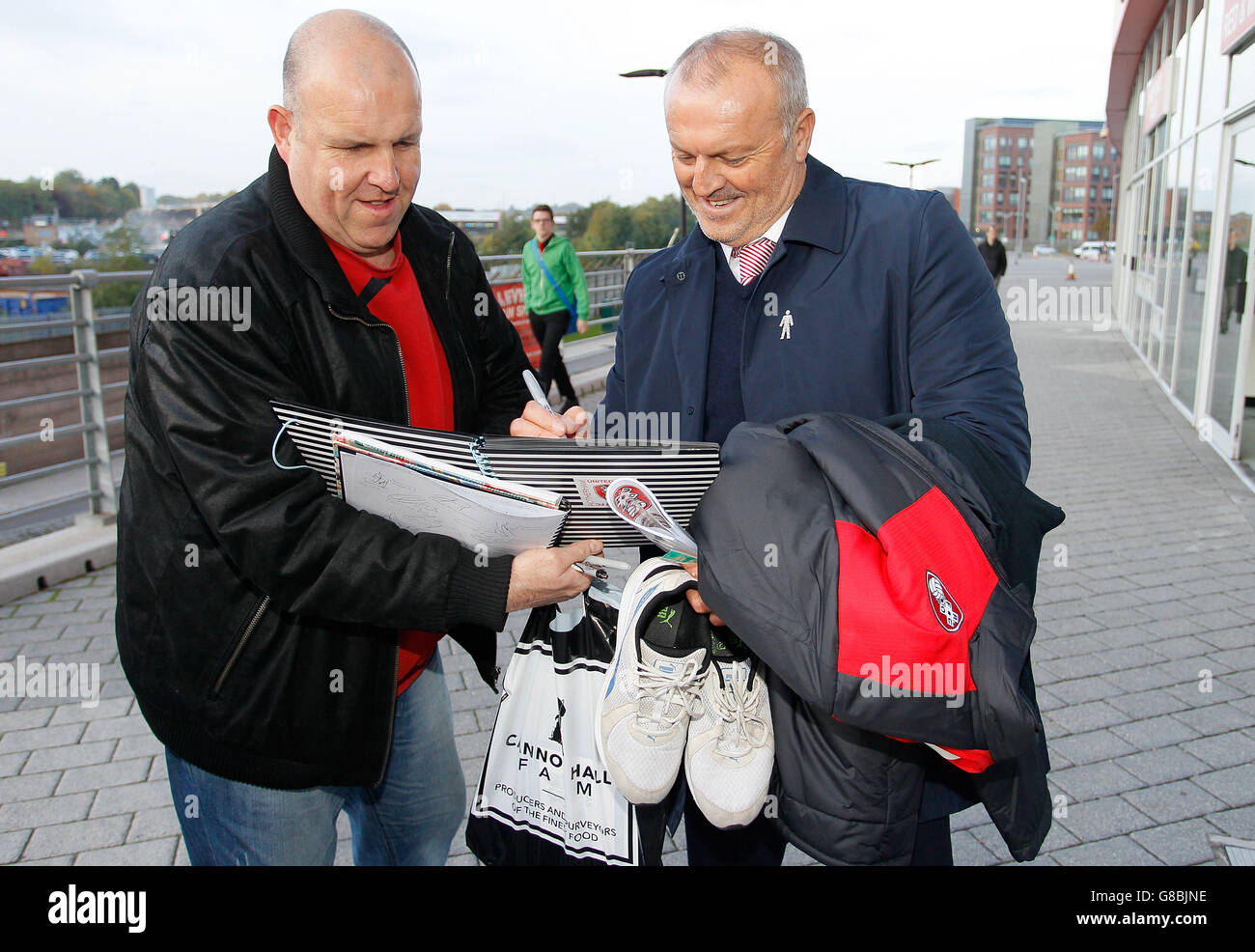 Rotherham United manager Neil Redfearn signs autographs on his arrival ...