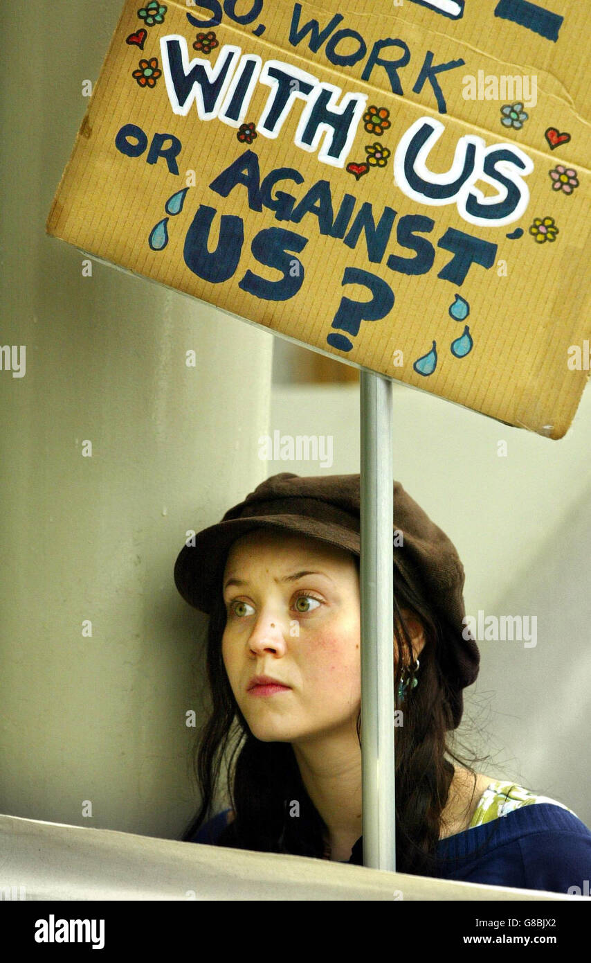 An anti-poverty protestor during a protest outside the Scottish ...