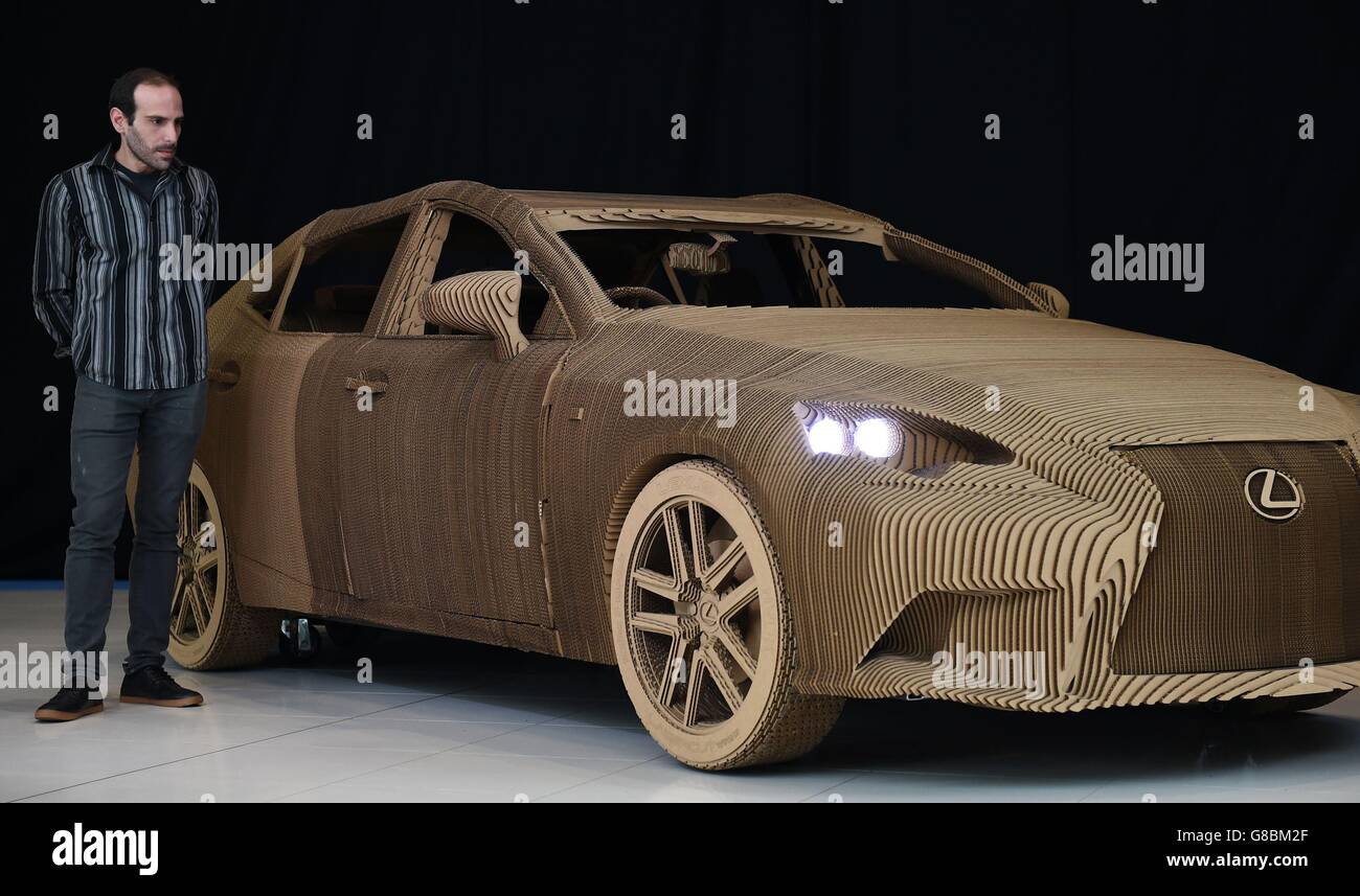 Ruben Marcos of Scales and Models next to a full-size origami inspired ...