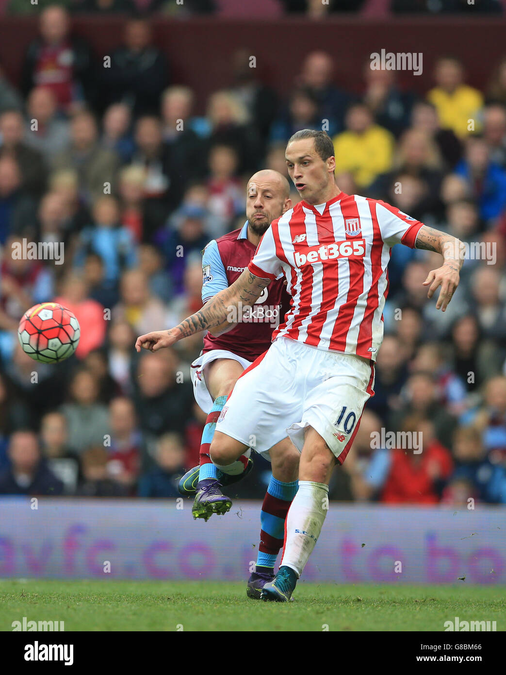 Stoke City's Marko Arnautovic and Aston Villa's Alan Hutton (left ...