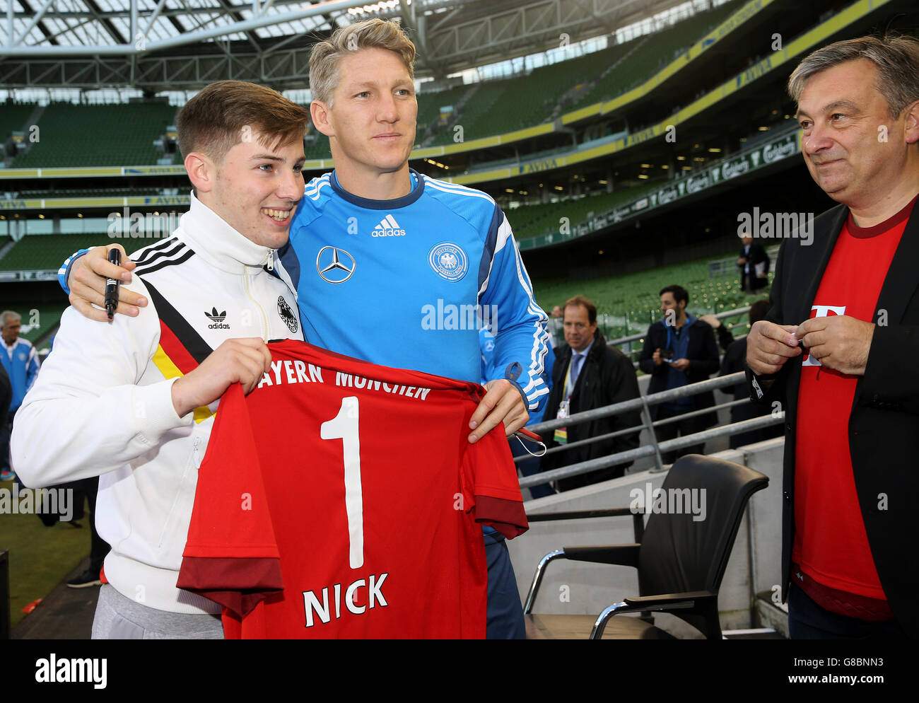Germany's Bastian Schweinsteiger with John Schuster (right) and Alexei ...