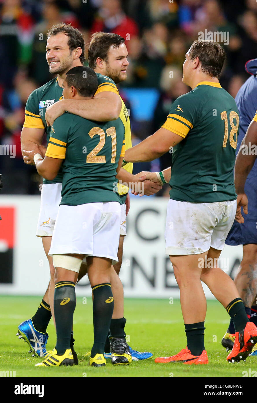 South Africa's Bismarck du Plessis celebrates victory with Rudy Paige ...