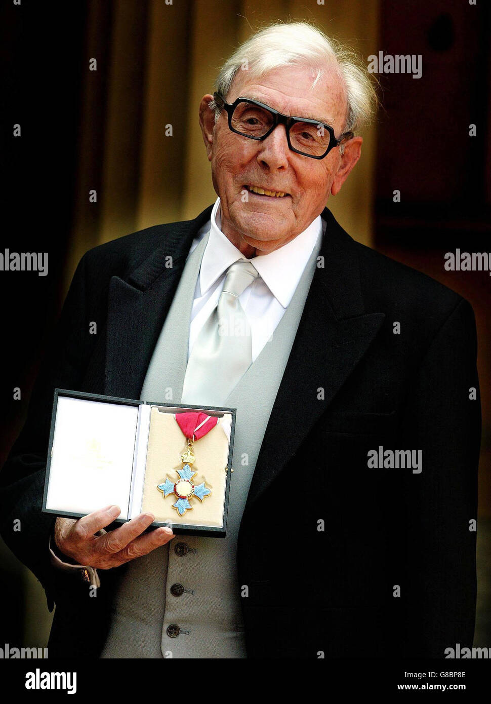Veteran comic actor Eric Sykes after receiving his CBE from the Queen ...