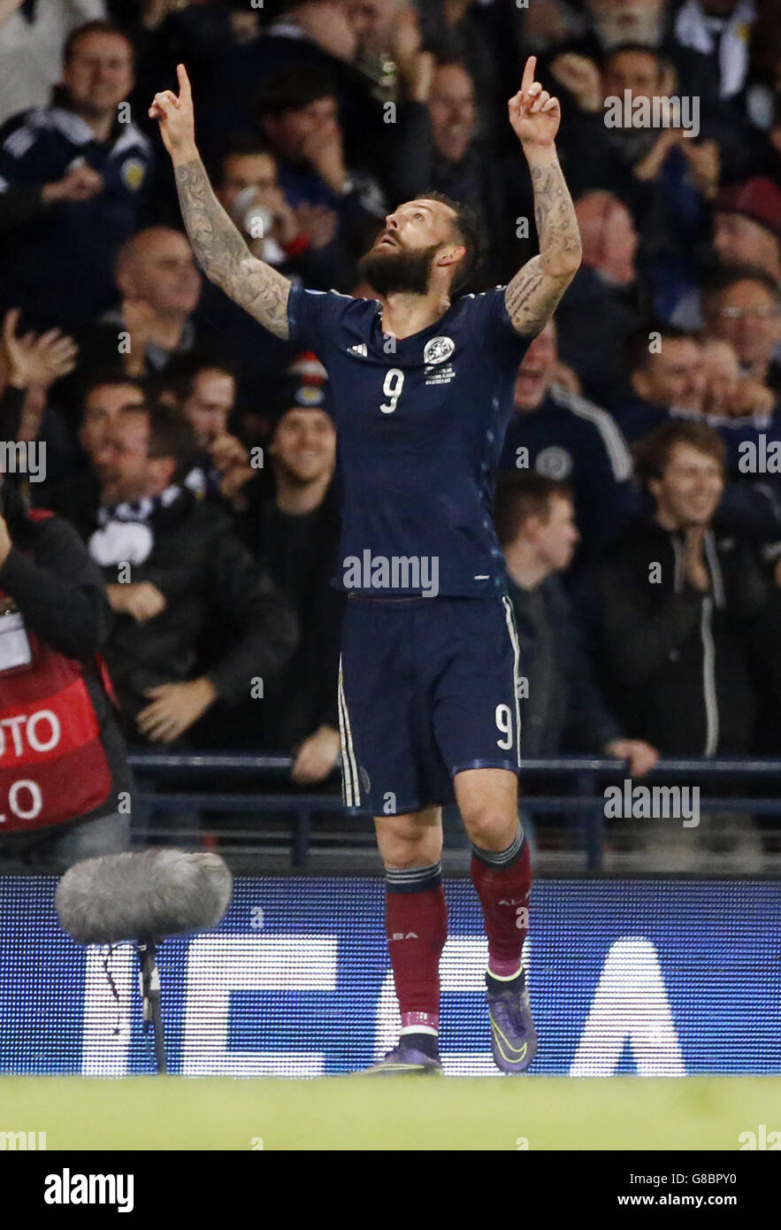Scotland's Steven Fletcher celebrates scoring his side's second goal ...