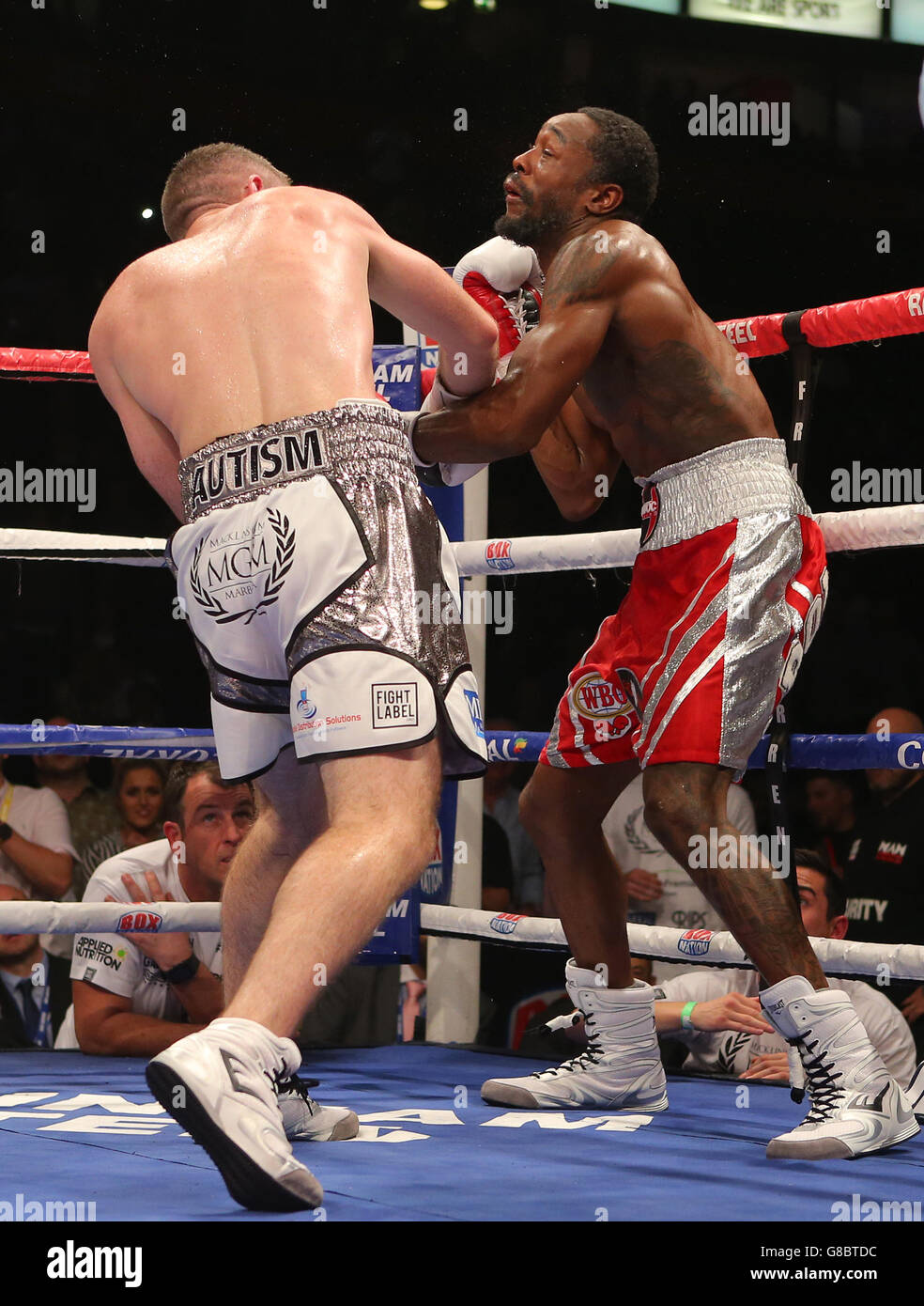 Liam Smith (left) knocks down John Thompson to win their WBO World ...